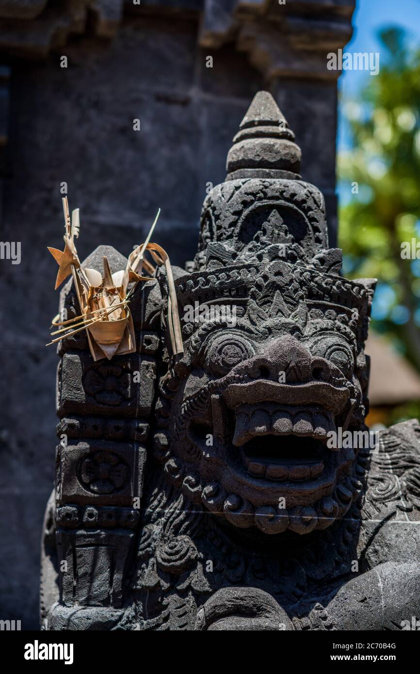 Statue at the temple in Bali Indonesia Stock Photo - Alamy