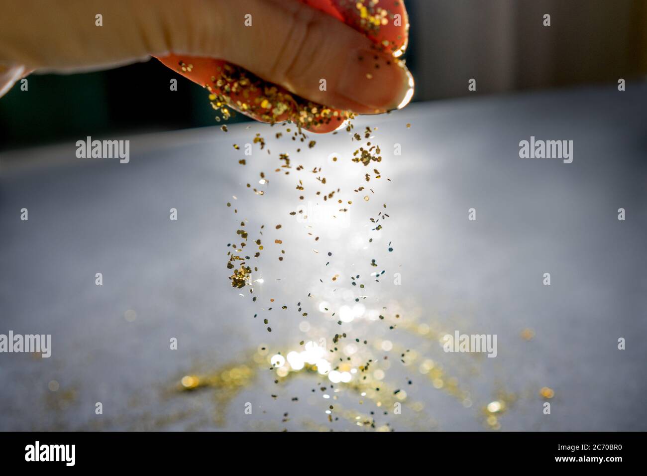 Golden flying sparkles on hi-res stock photography and images - Alamy