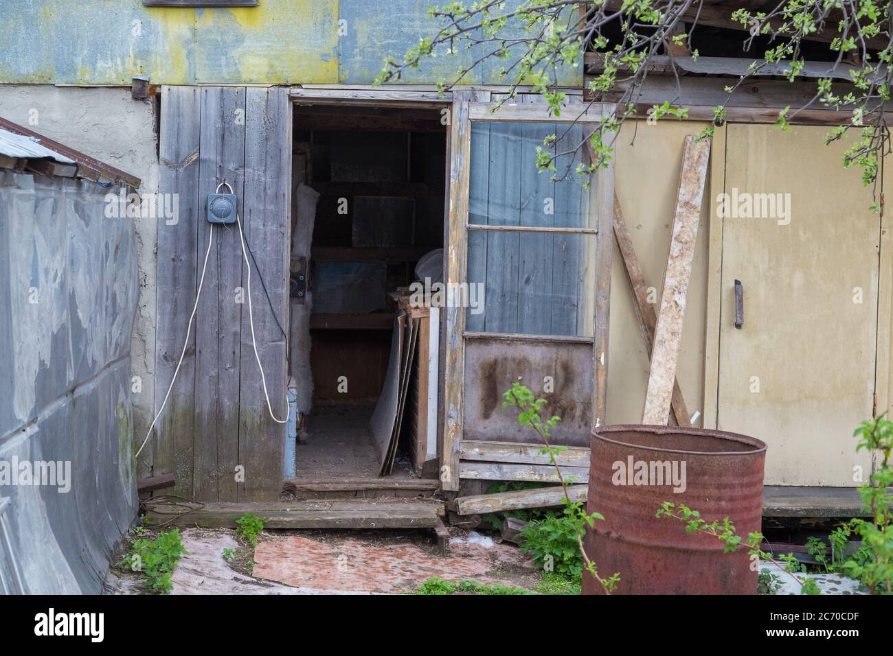 Creepy door opening with scary wood and, wooden wall Stock Photo - Alamy
