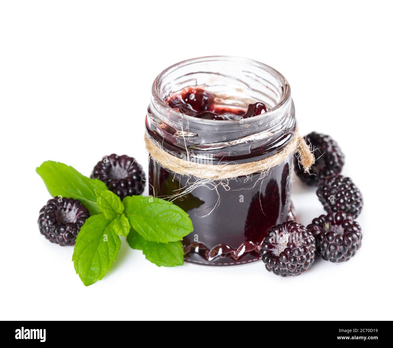 Jam made from black raspberries Cumberland in glass jar and leaves of ...