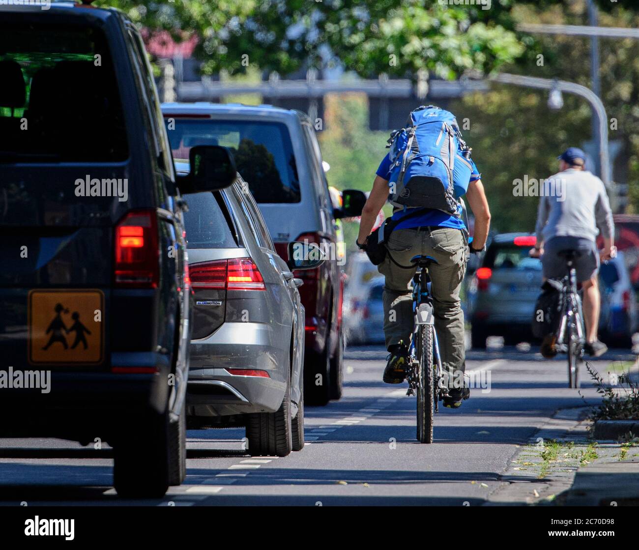 Car overtaking cycle hi-res stock photography and images - Alamy