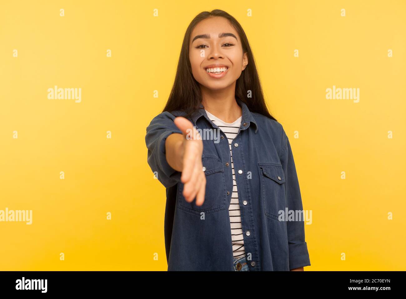 Let's get acquainted! Portrait of friendly kind girl in denim shirt ...