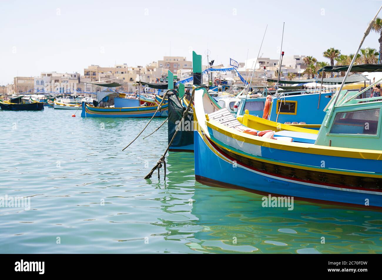 Typical maltese fishing boats, called luzzu with the eye of Osiris, in ...