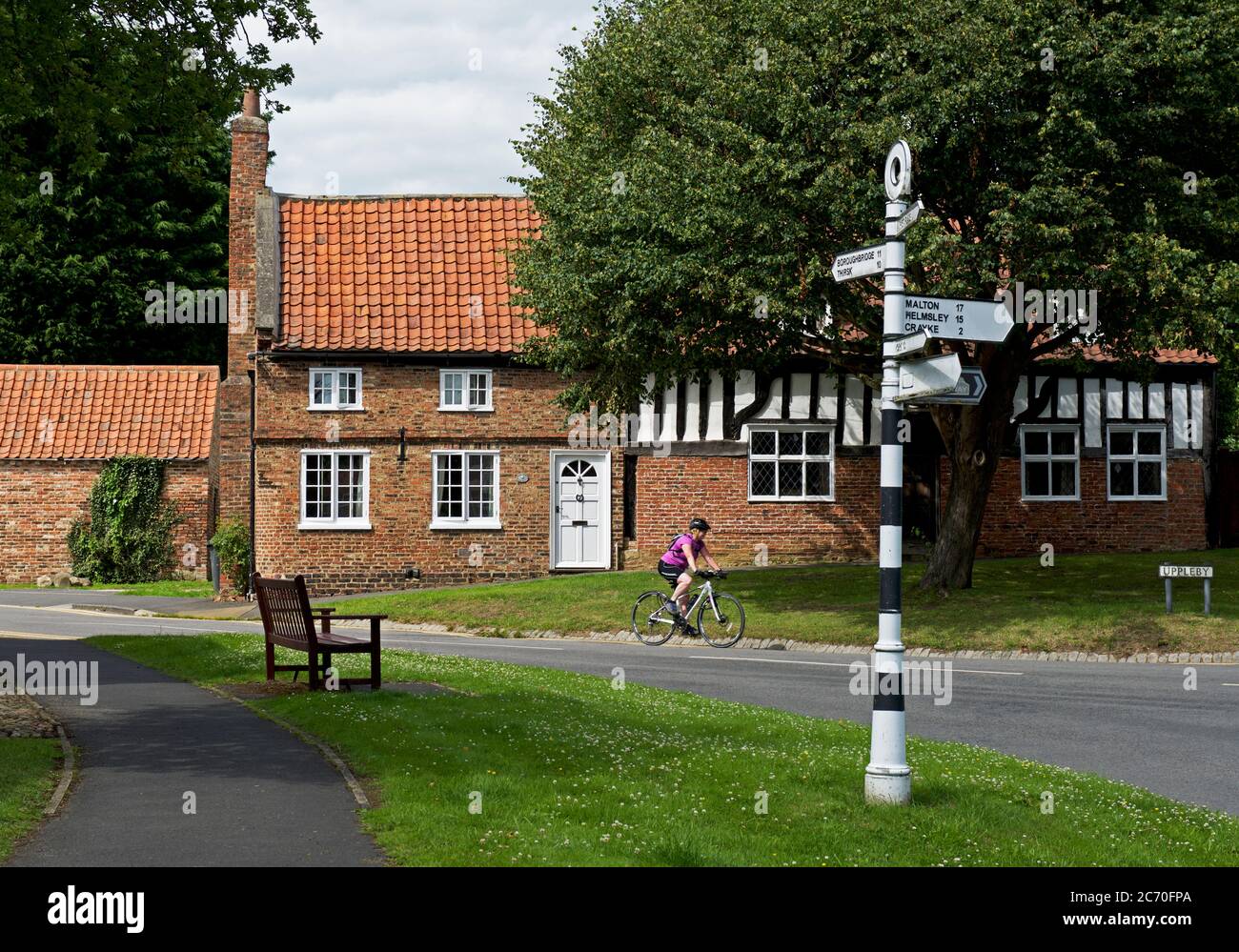 Cyclist in Easingwold, North Yorkshire, England UK Stock Photo - Alamy