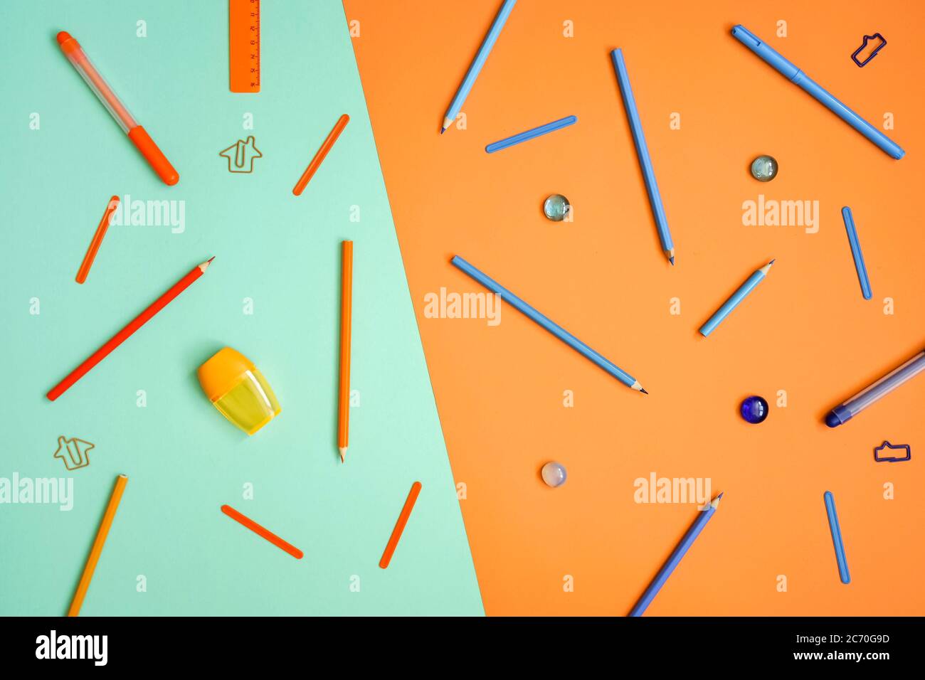 Orange stationery on turquoise. Blue stationery on orange background ...
