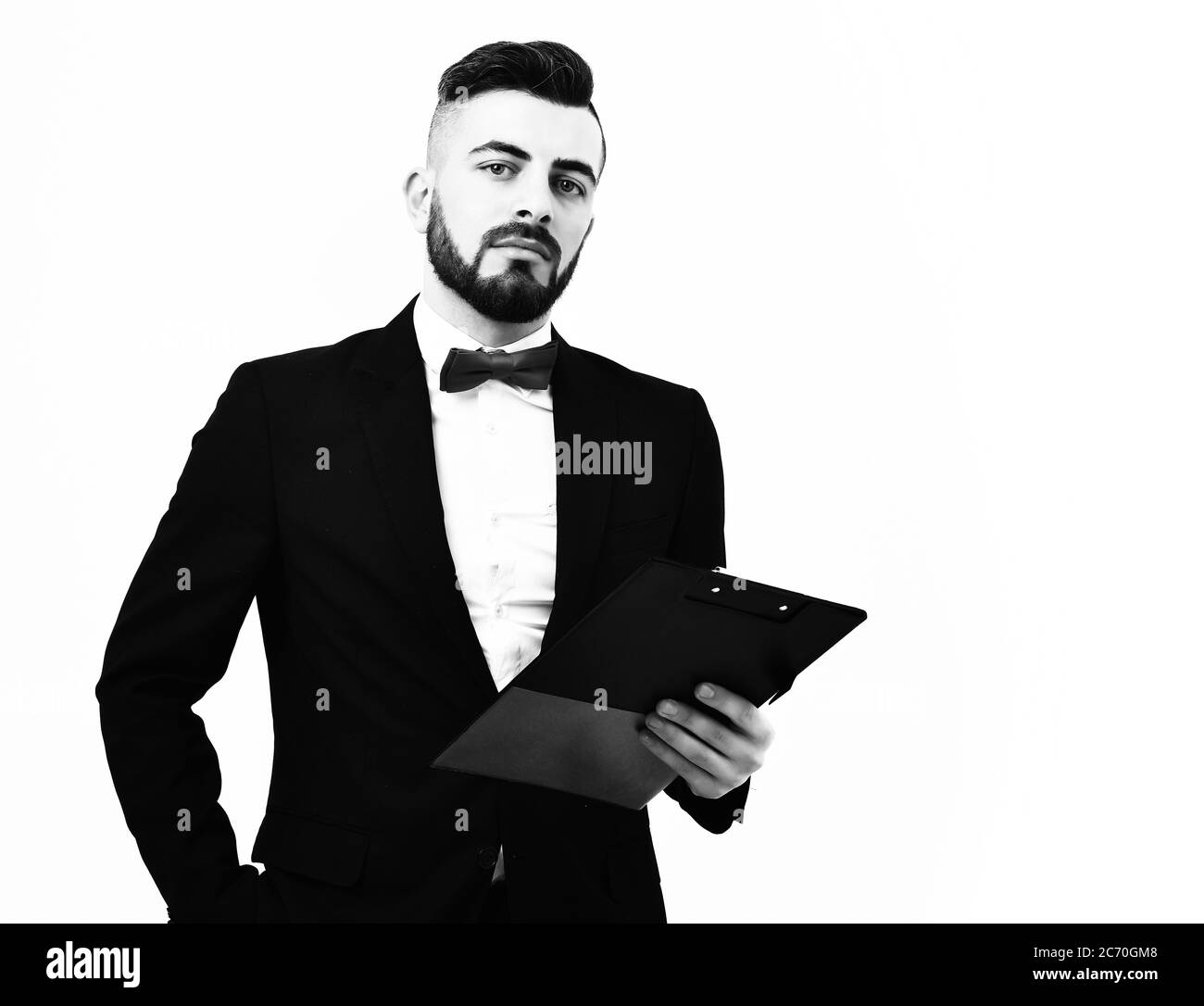 Stylish presenter with beard and fashionable hairdo in classic black ...