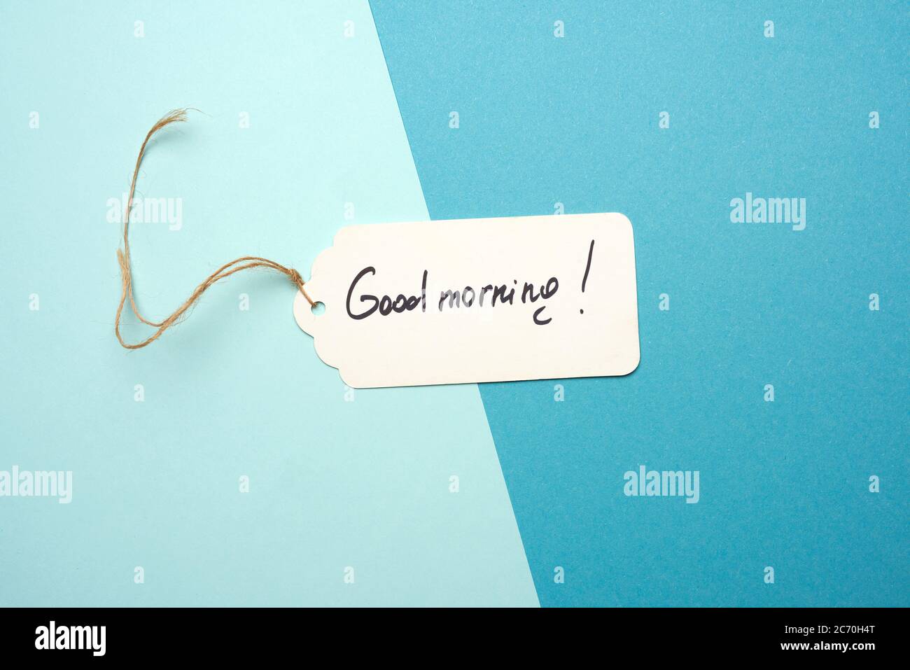 white paper tag with brown rope and the inscription good morning, blue ...