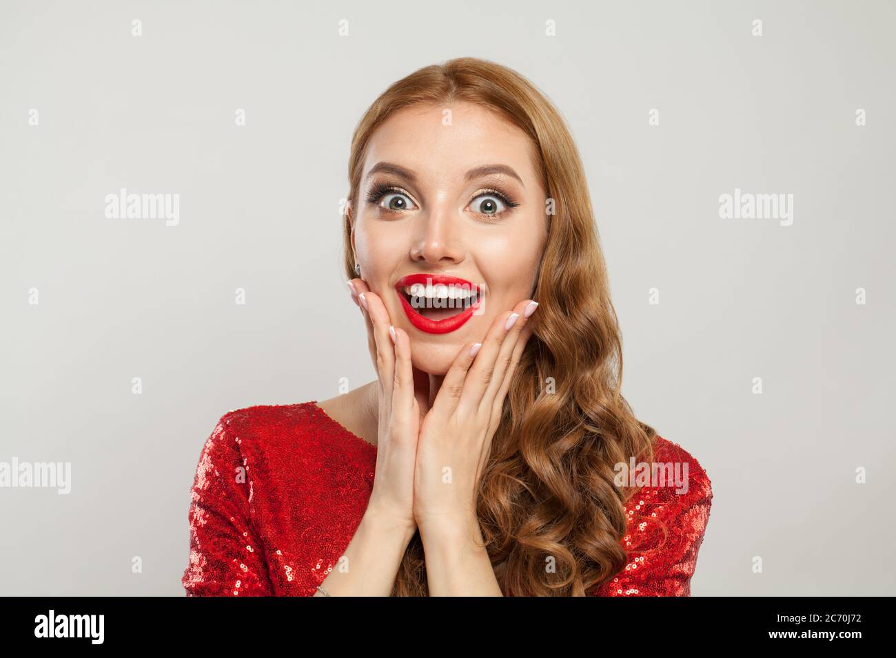 Happy exsited redhead woman with ginger hair and red lips makeup on ...