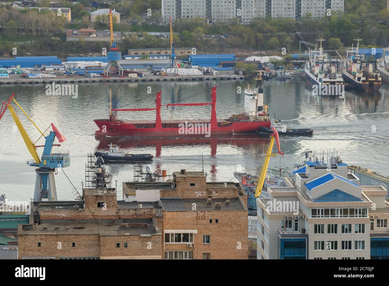 VLADIVOSTOK, RUSSIA - MAY 11, 2020: The cargo ship is sailing across ...
