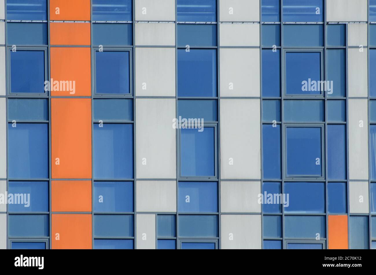 The surface in an abstract geometric pattern. Building wall modern ...