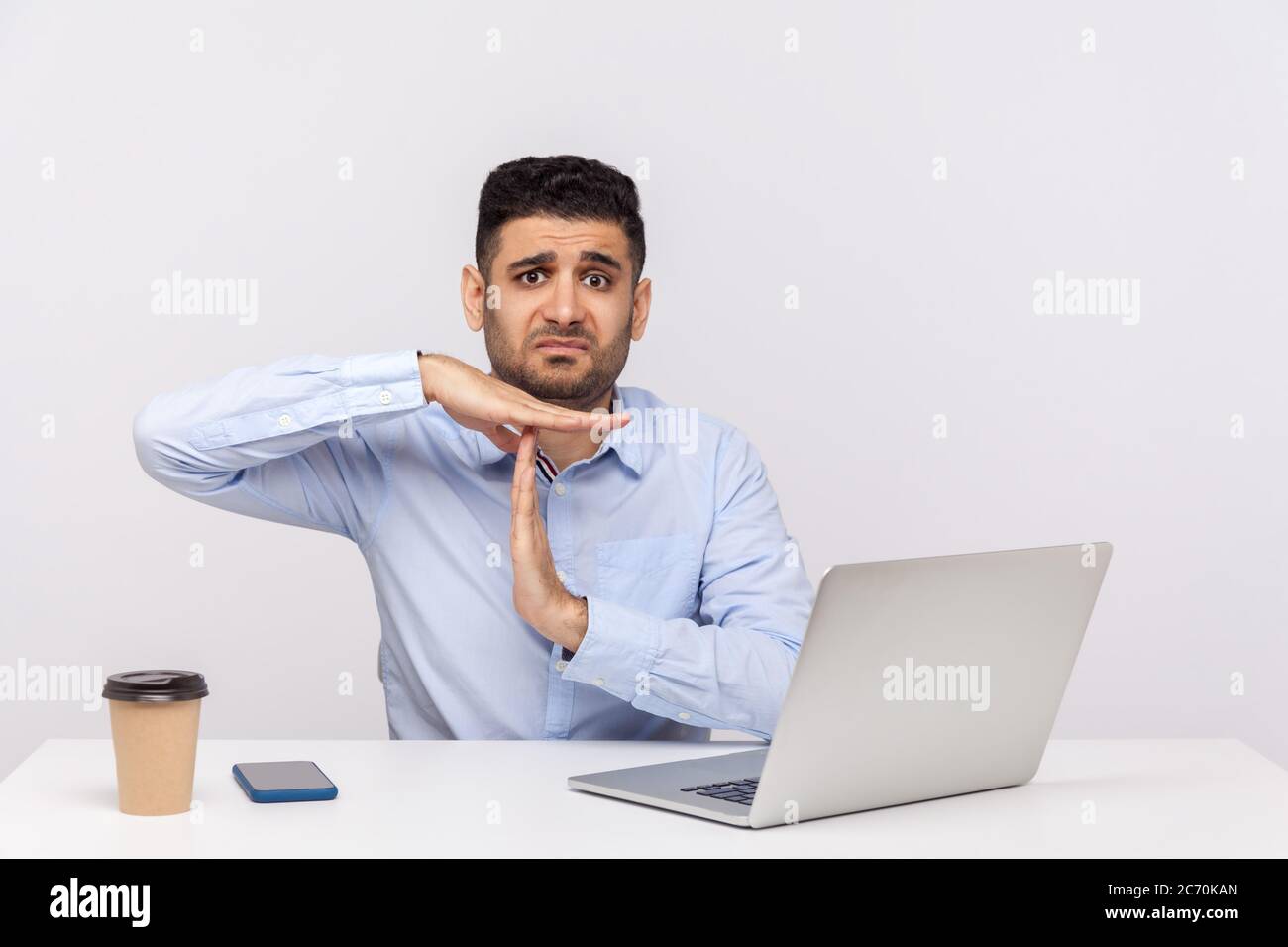 Business man at desk begging hi-res stock photography and images - Alamy