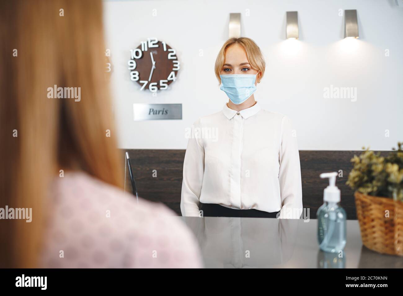 Hotel receptionist mask hi-res stock photography and images - Alamy