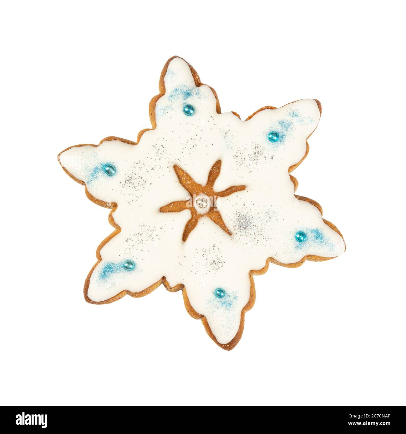 Traditional Christmas gingerbread in the shape of snowflake isolated on ...