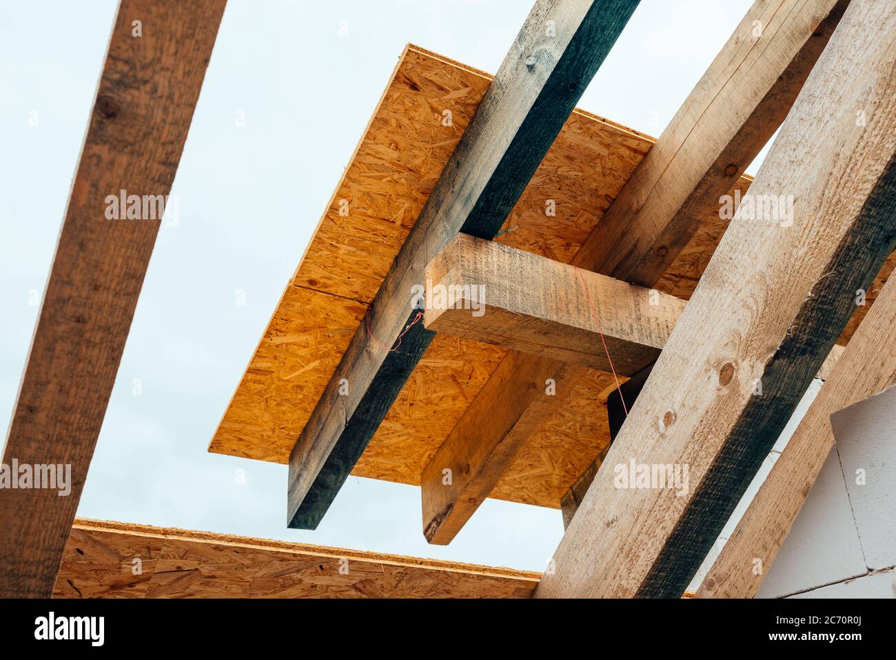 Construction of a single-family house roof structure Stock Photo - Alamy