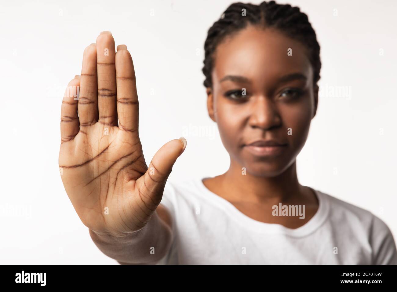 African American Girl Gesturing Stop Posing Over White Studio ...