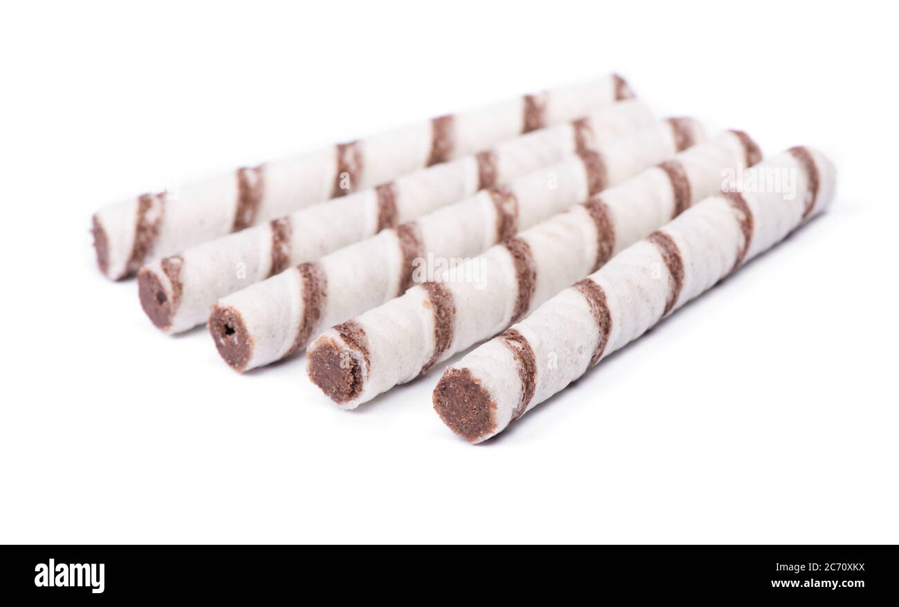 Group of sweet spiral tubes isolated on white background Stock Photo ...