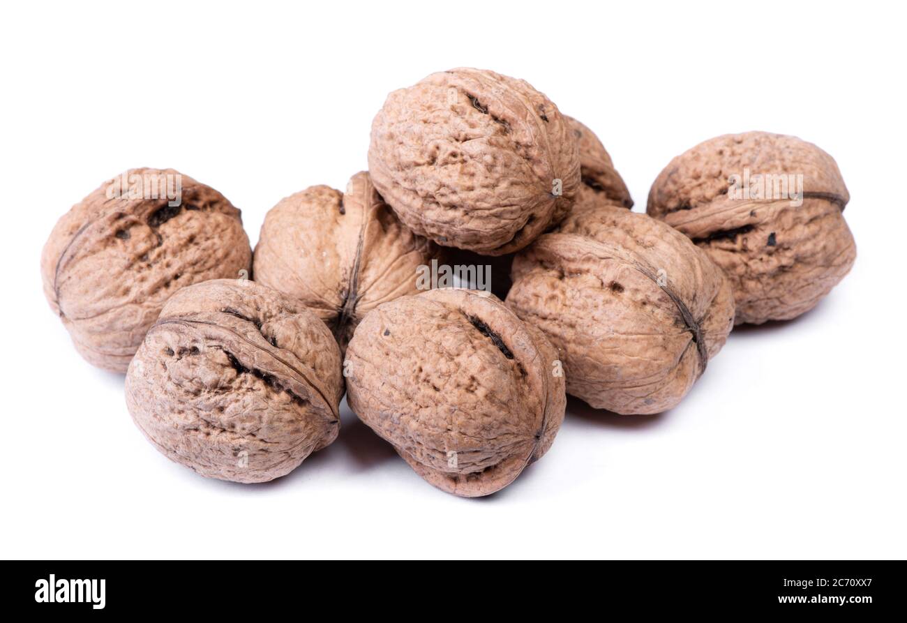 Group of big whole walnuts isolated on white background Stock Photo - Alamy