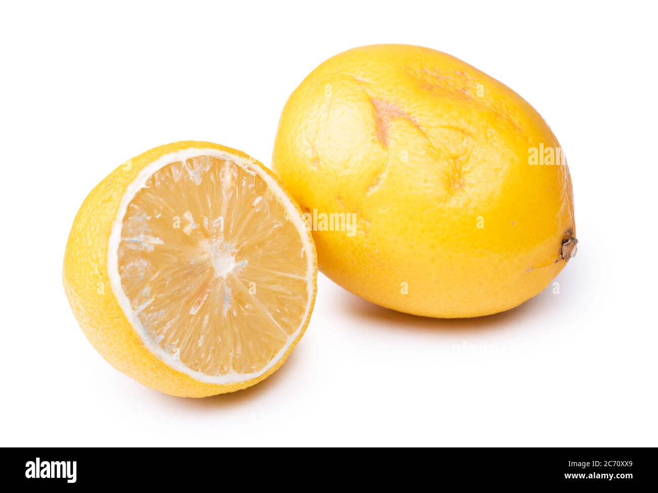 Spoiled lemon isolated on white background Stock Photo - Alamy