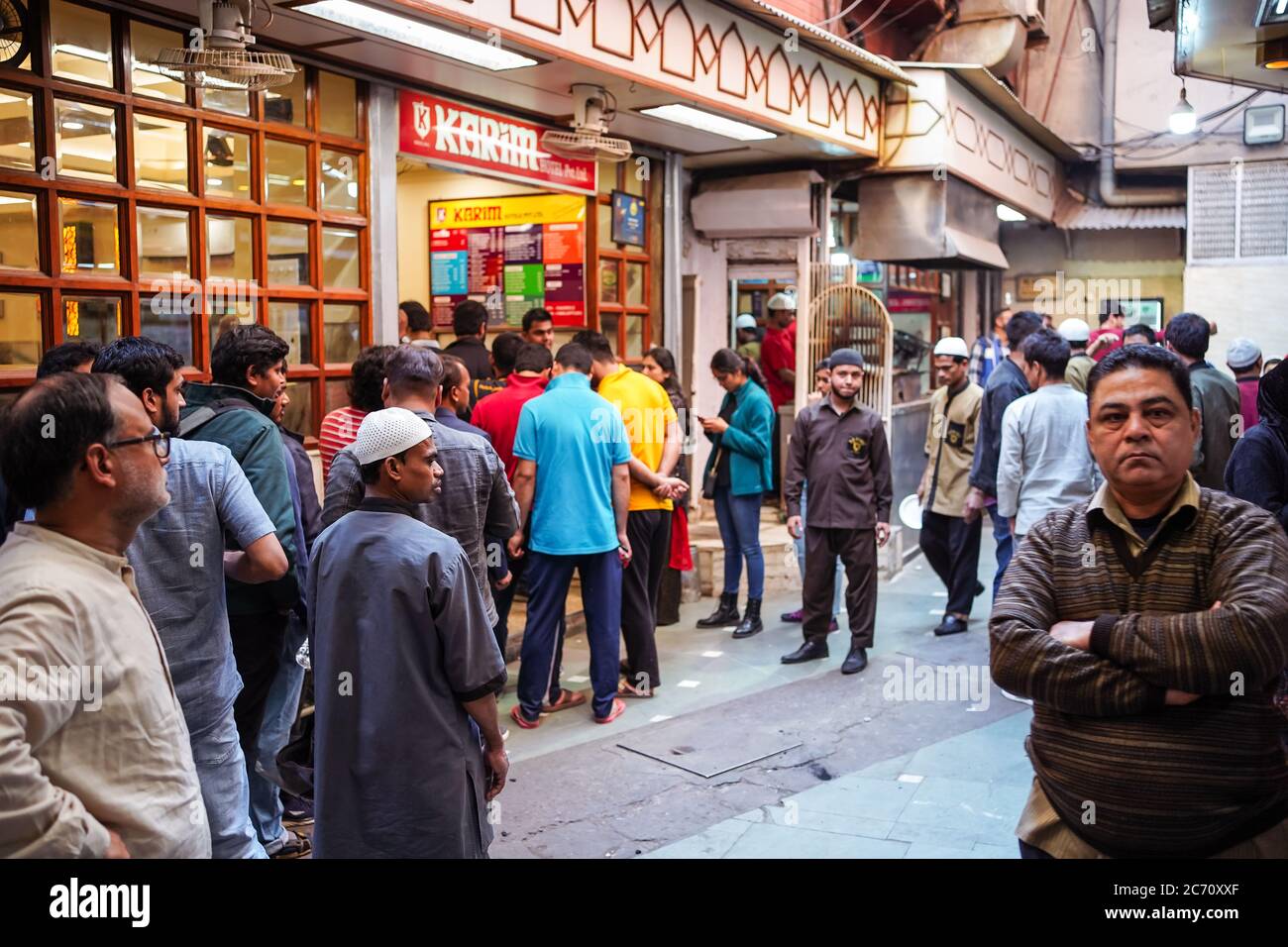 New Delhi / India - February 18, 2020: People waiting in long queue at ...