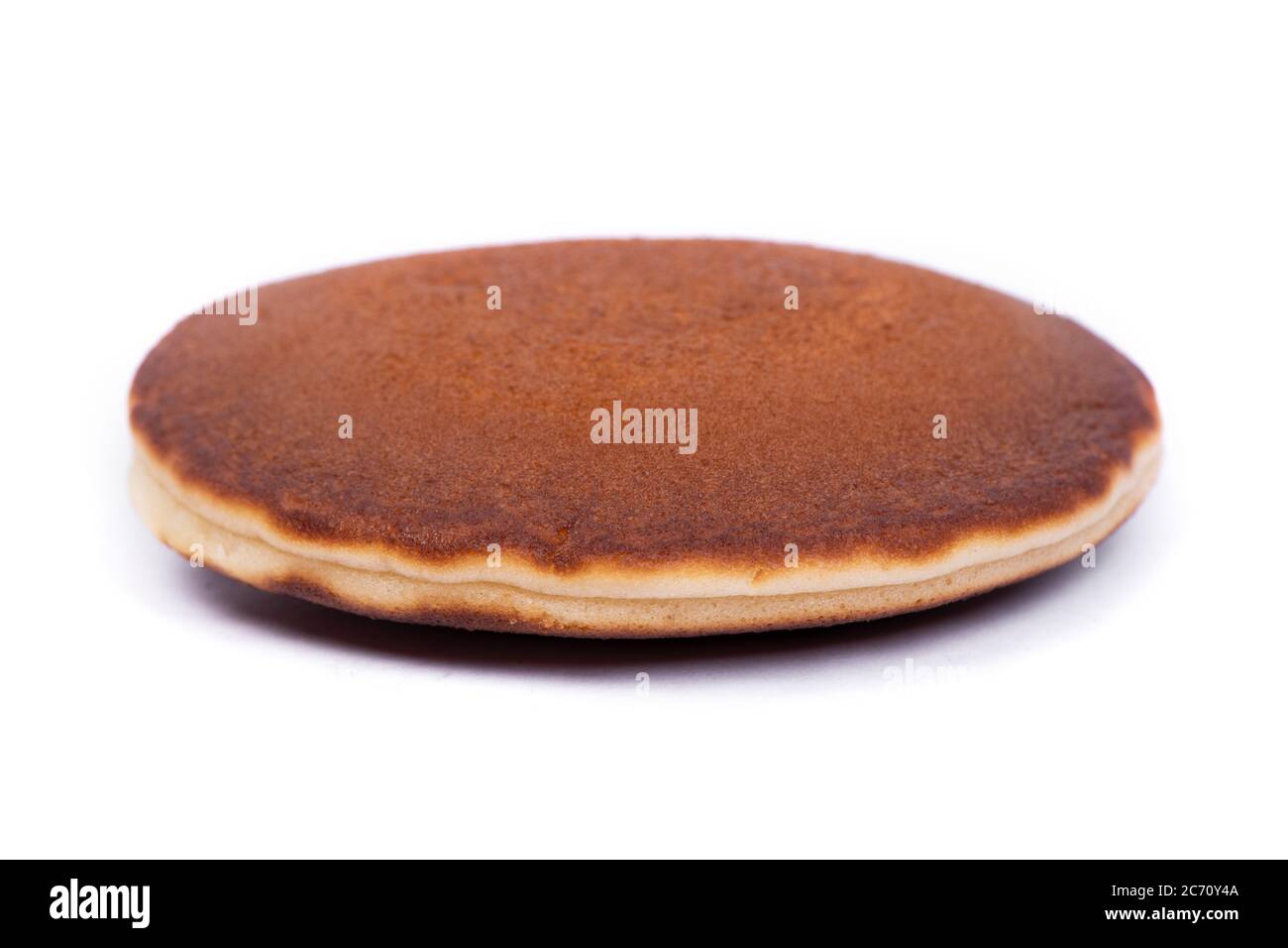 One pancake isolated on a white background Stock Photo - Alamy