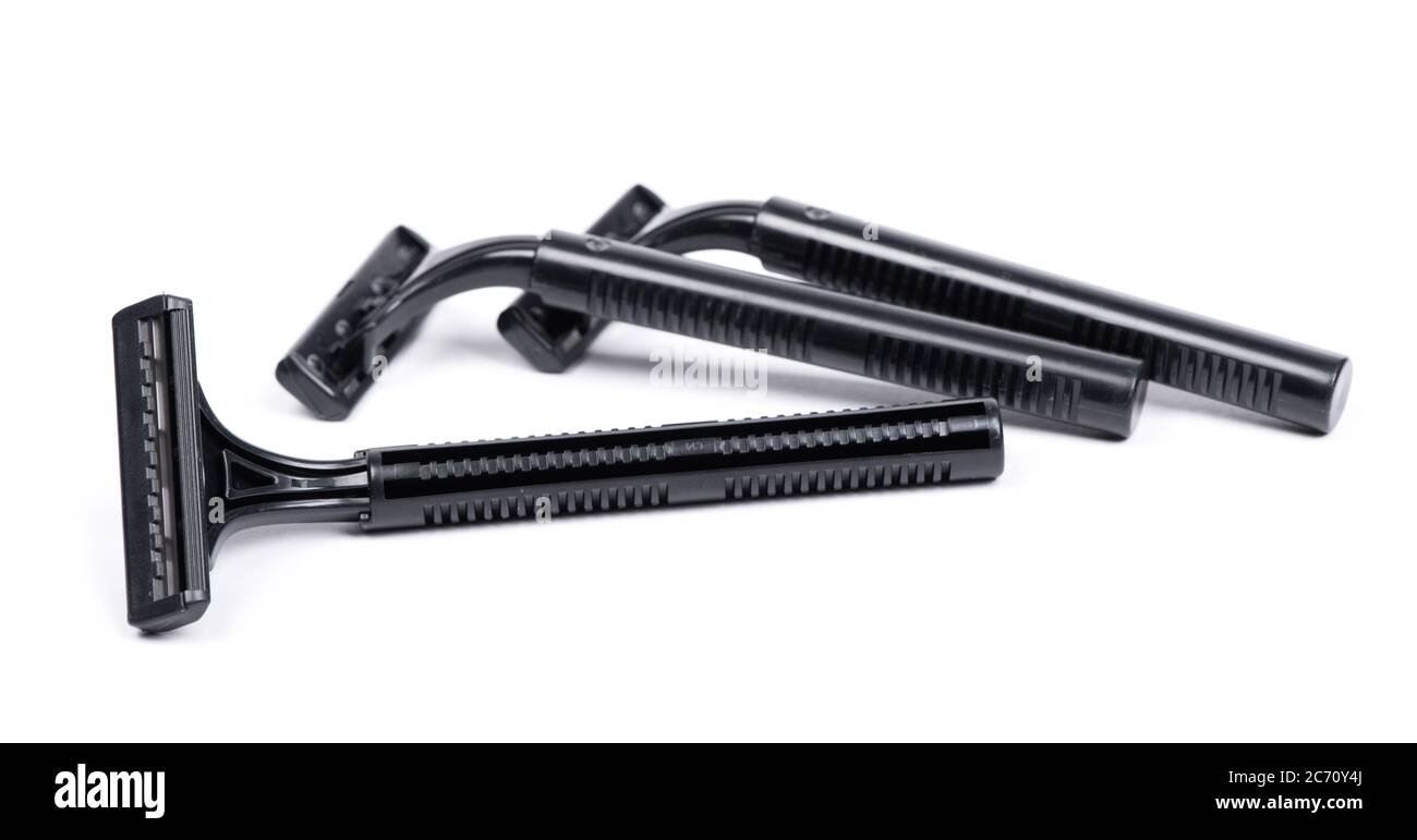 Group of new black plastic disposable shavers isolated on white ...