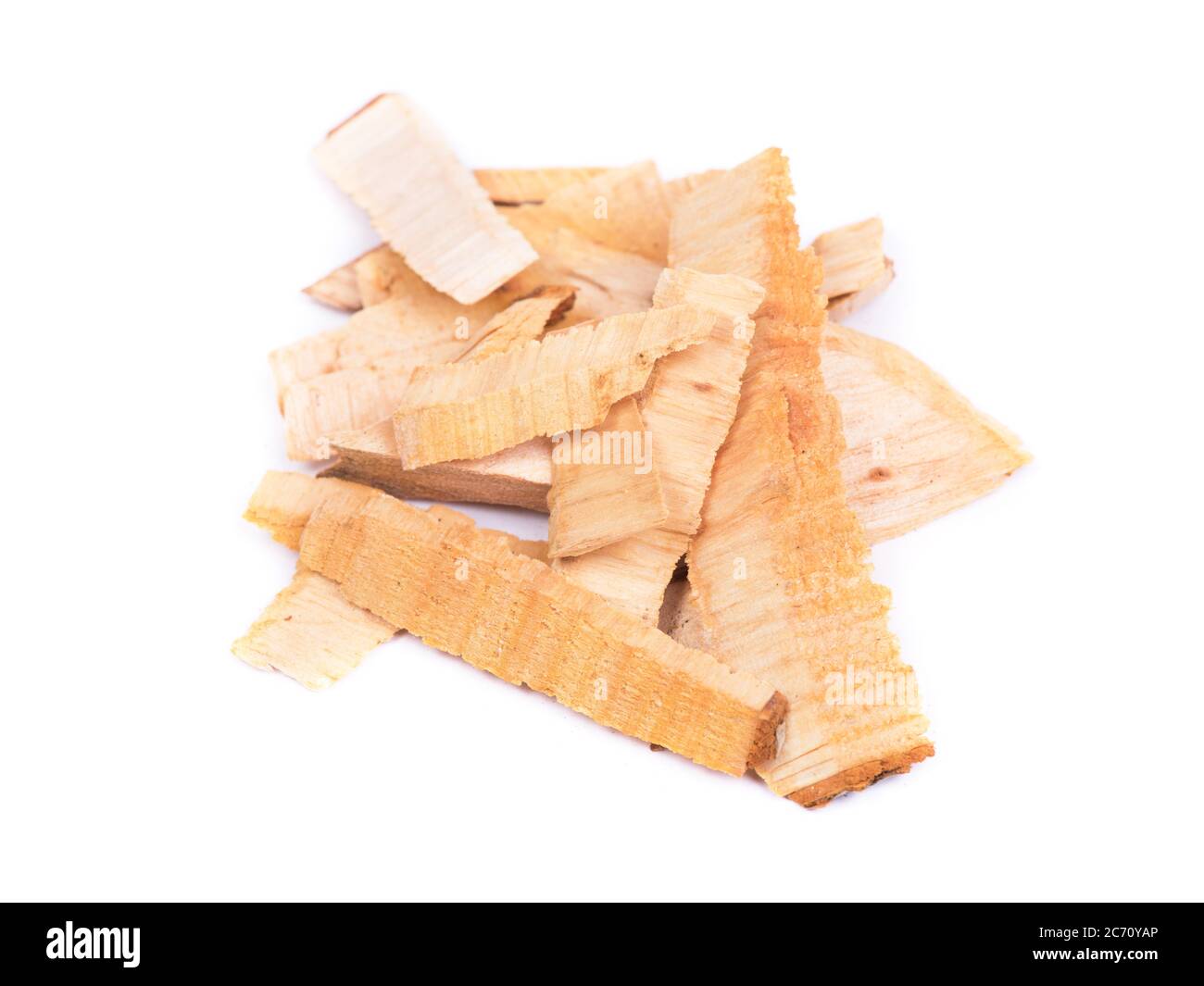 Pile of wood chips isolated on white background Stock Photo - Alamy