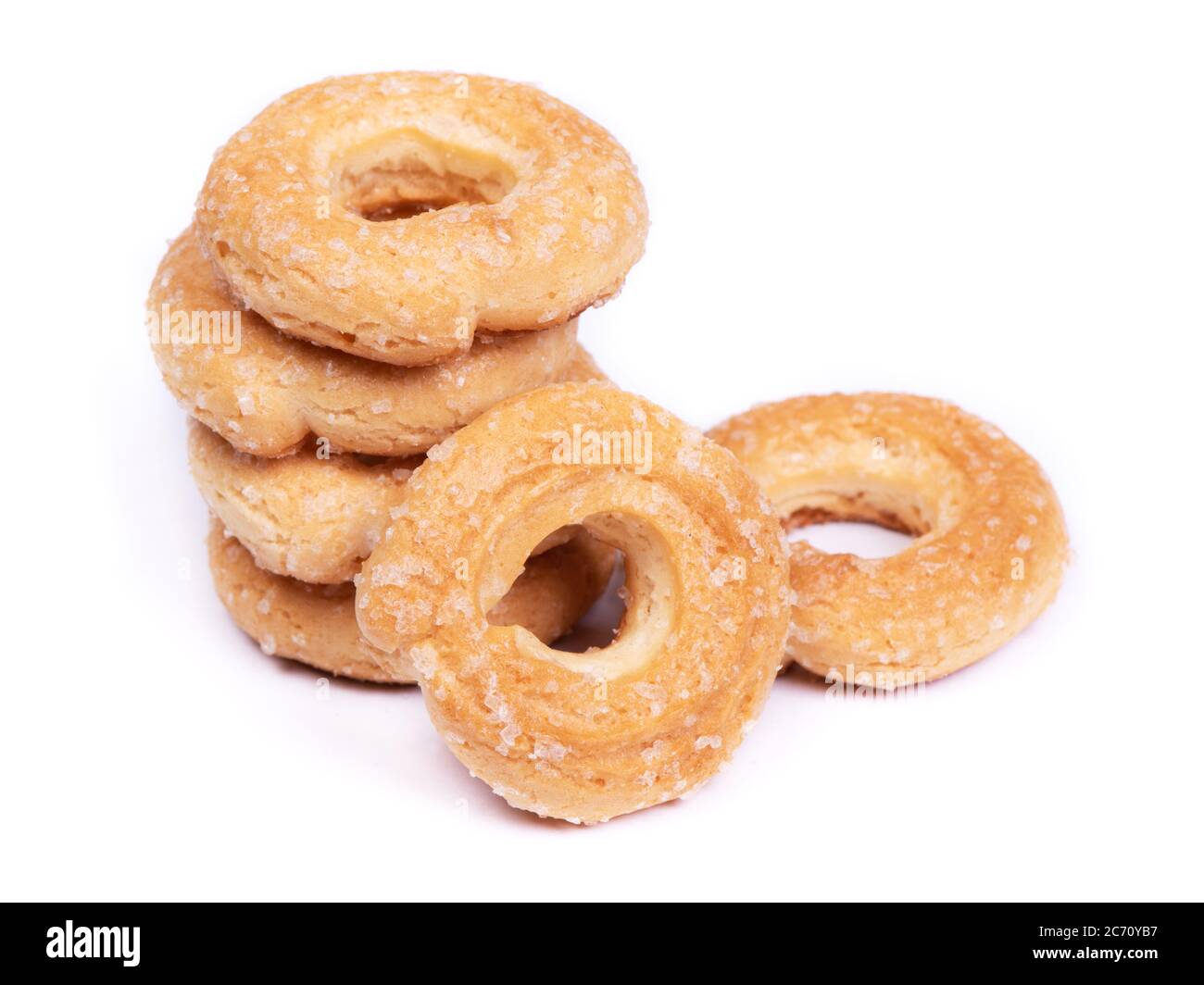 Group of dried donuts, ring-shaped pastry isolated over white ...