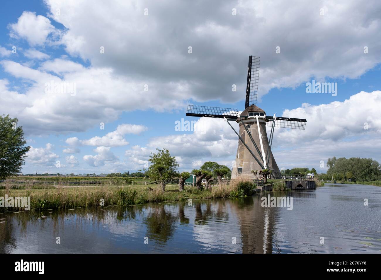 Traditional setting of the historical dutch windmills landscape at the ...