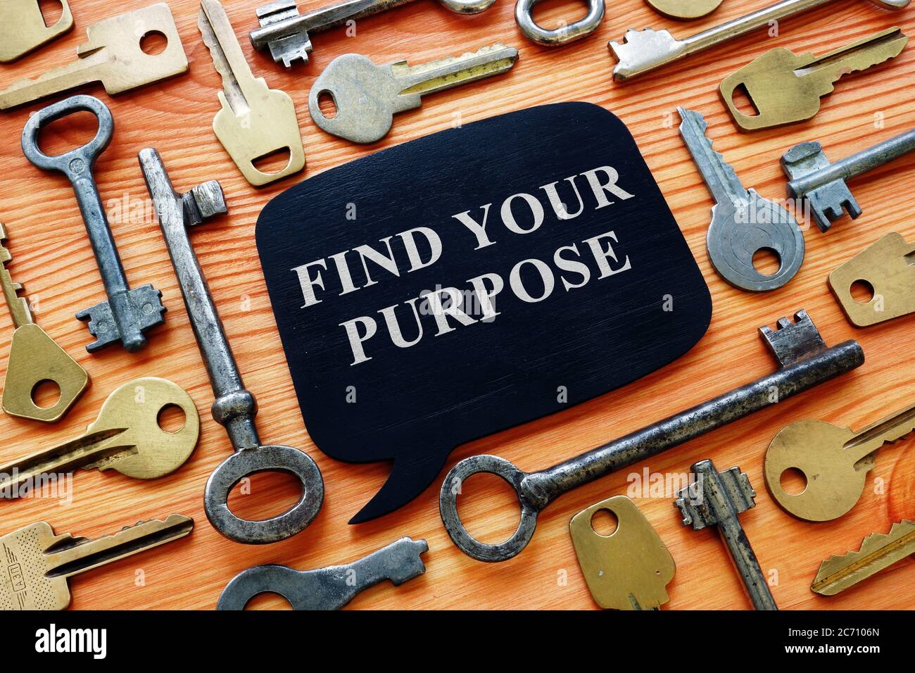 Find your purpose motivational phrase and keys Stock Photo - Alamy