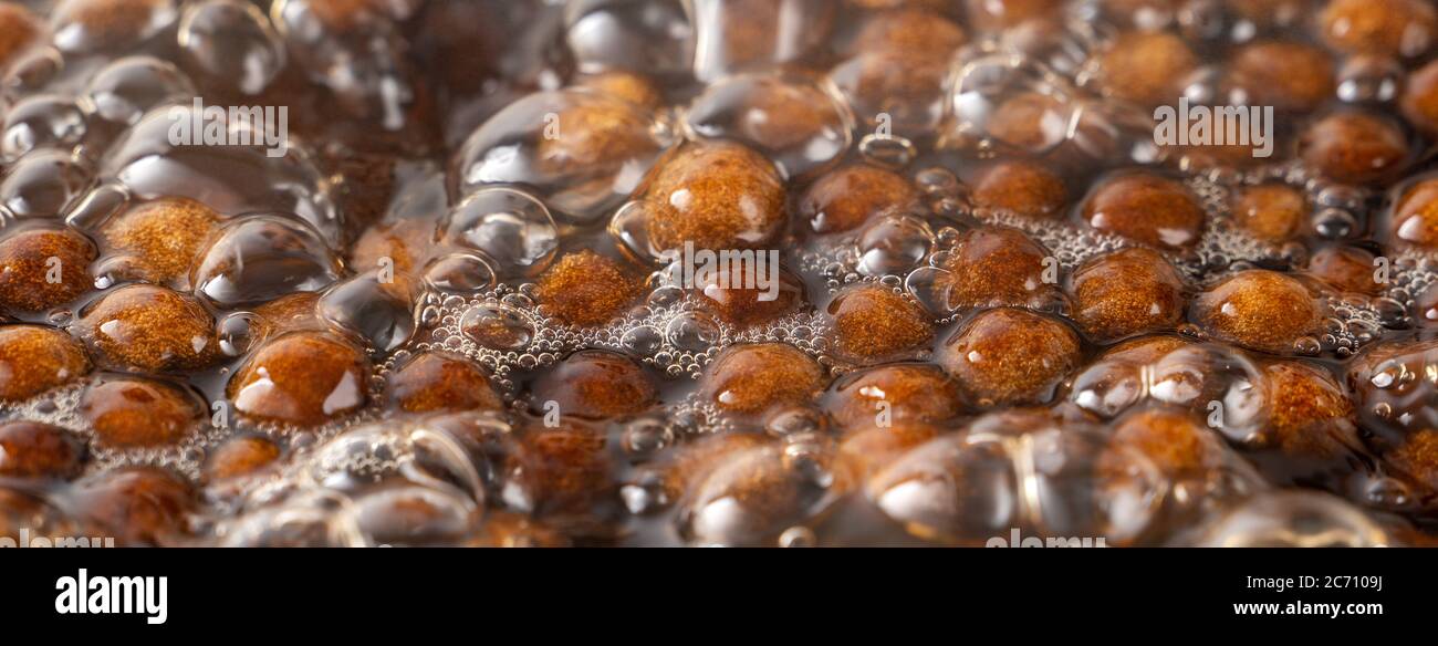 Cooking, boiling brown sugar flavor tapioca pearl balls, ingredient of ...