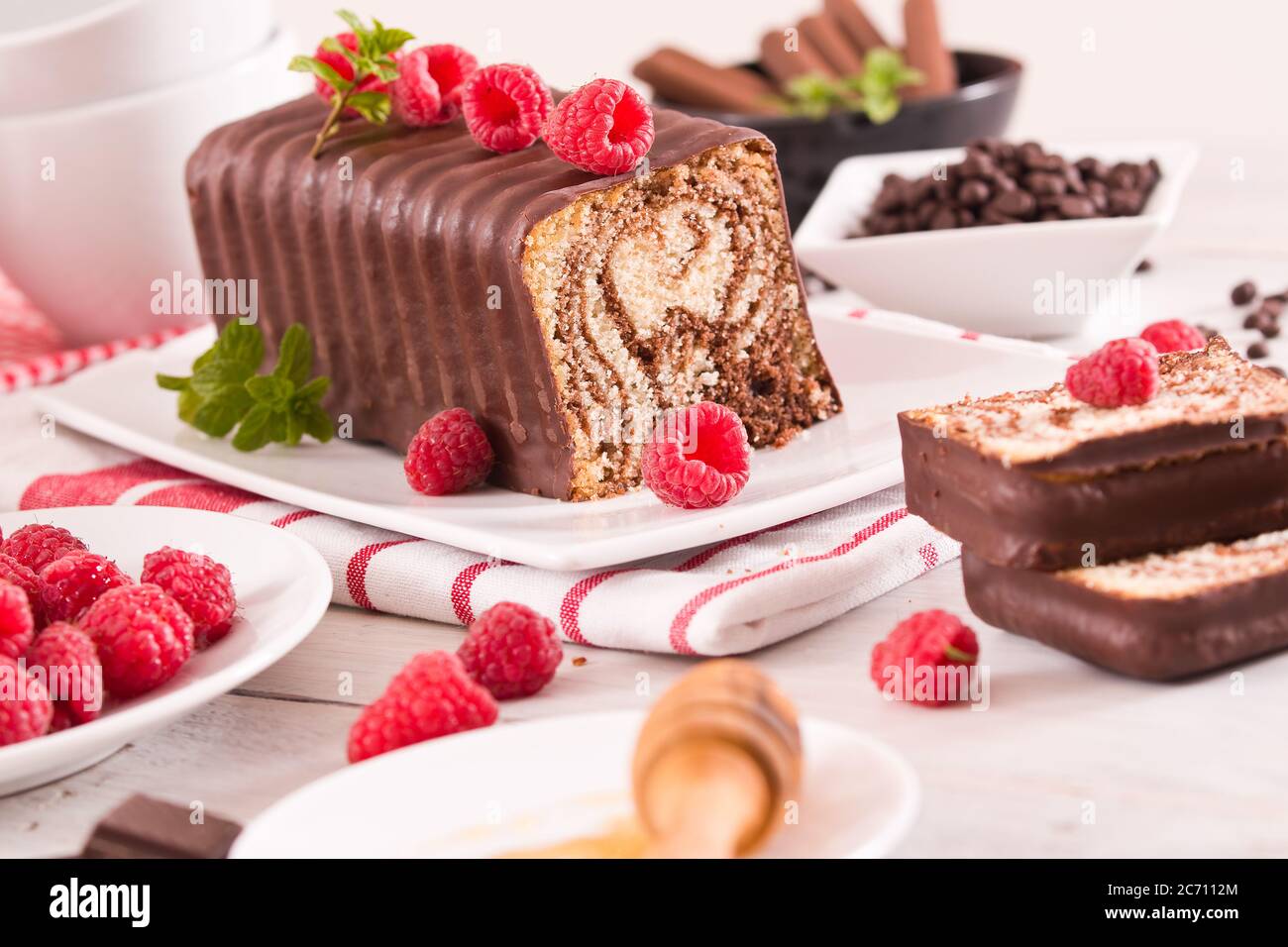 Marble cake with raspberries Stock Photo - Alamy