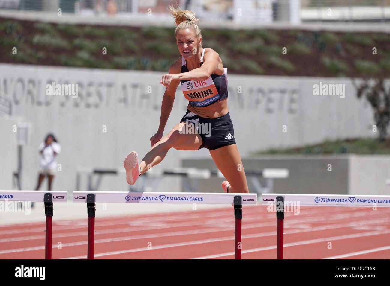 Georganne Moline wins the women's 300m hurdles in 39.08 during the ...