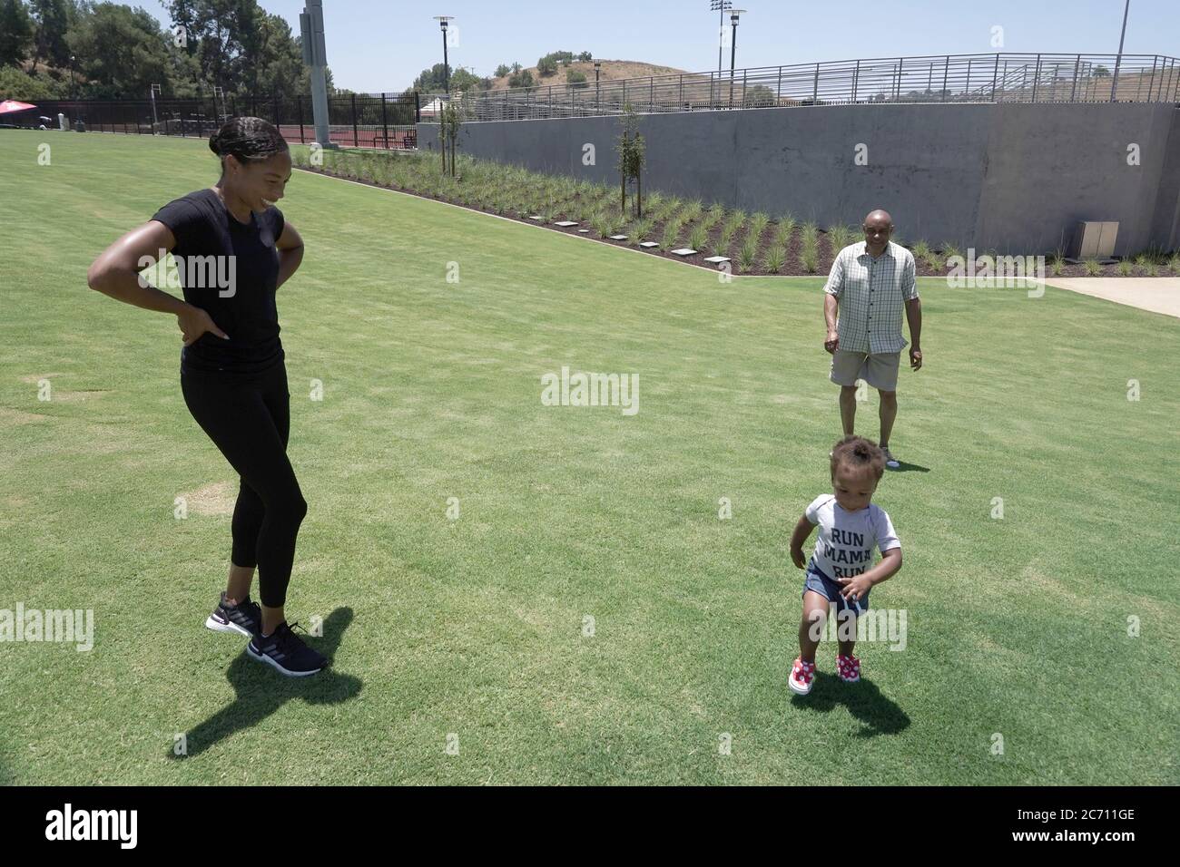 Allyson Felix (left) with daughter Camryn Ferguson and father Paul ...