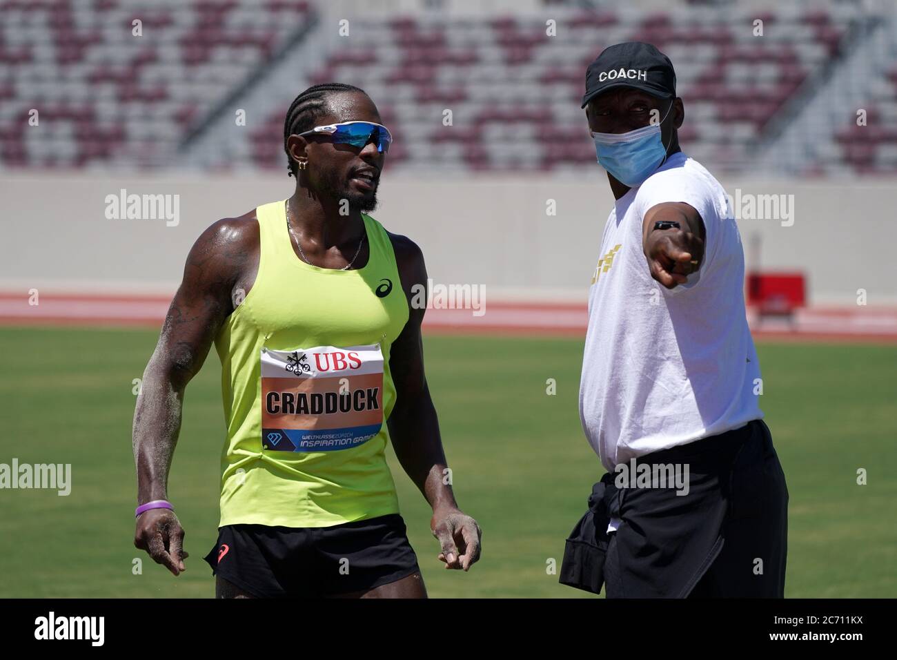Omar Craddock (left) with coach Al Joyner during the Zurich Weltklasse ...