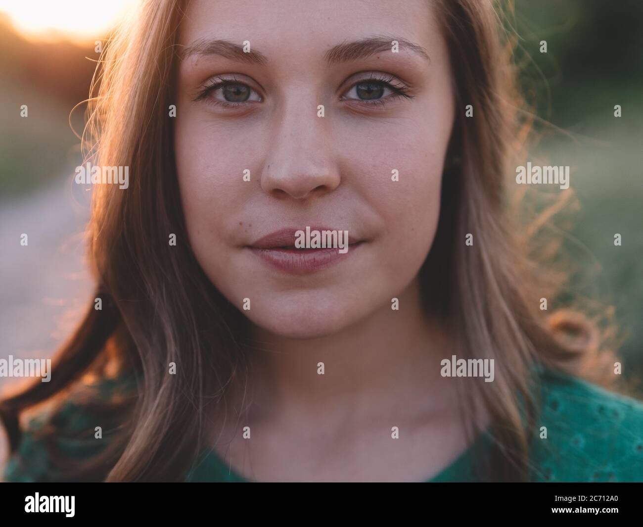 Teenager girl portrait at sunset Stock Photo - Alamy