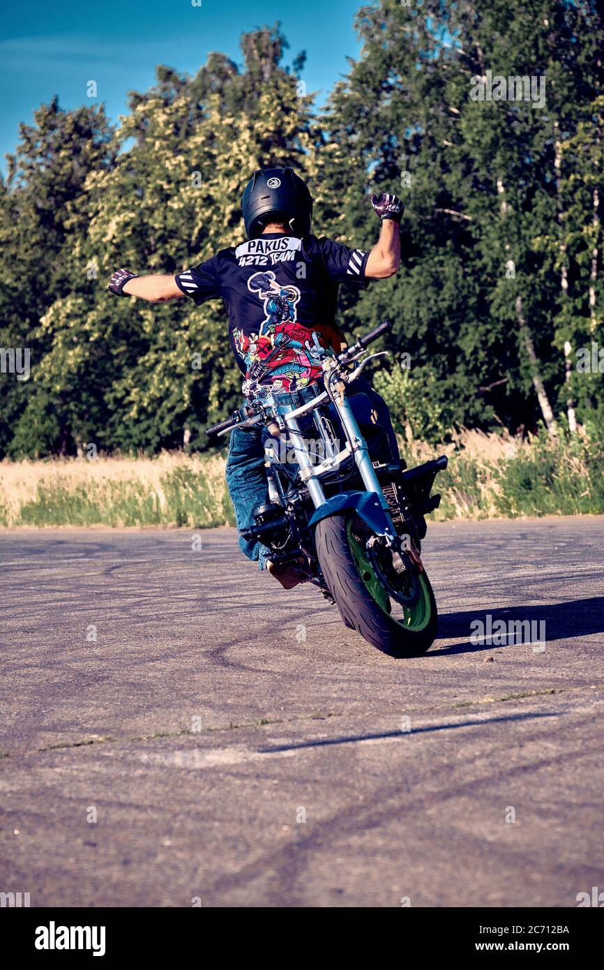 Moscow, Russia - 12 Jul 2020: Moto rider making a stunt on his ...