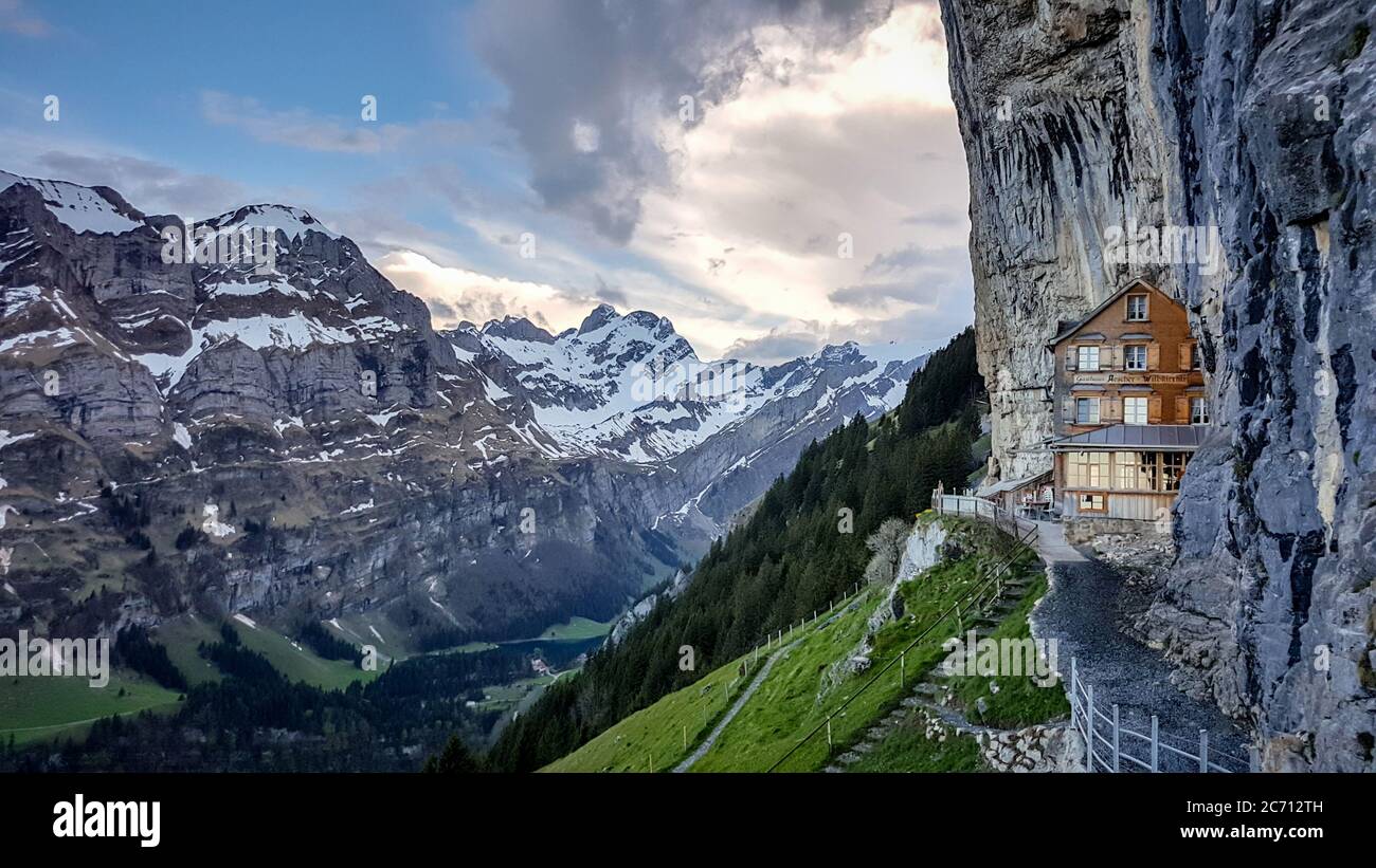 EBENALP, SWITZERLAND, May 2017: Ebenalp with its famous cliff inn ...