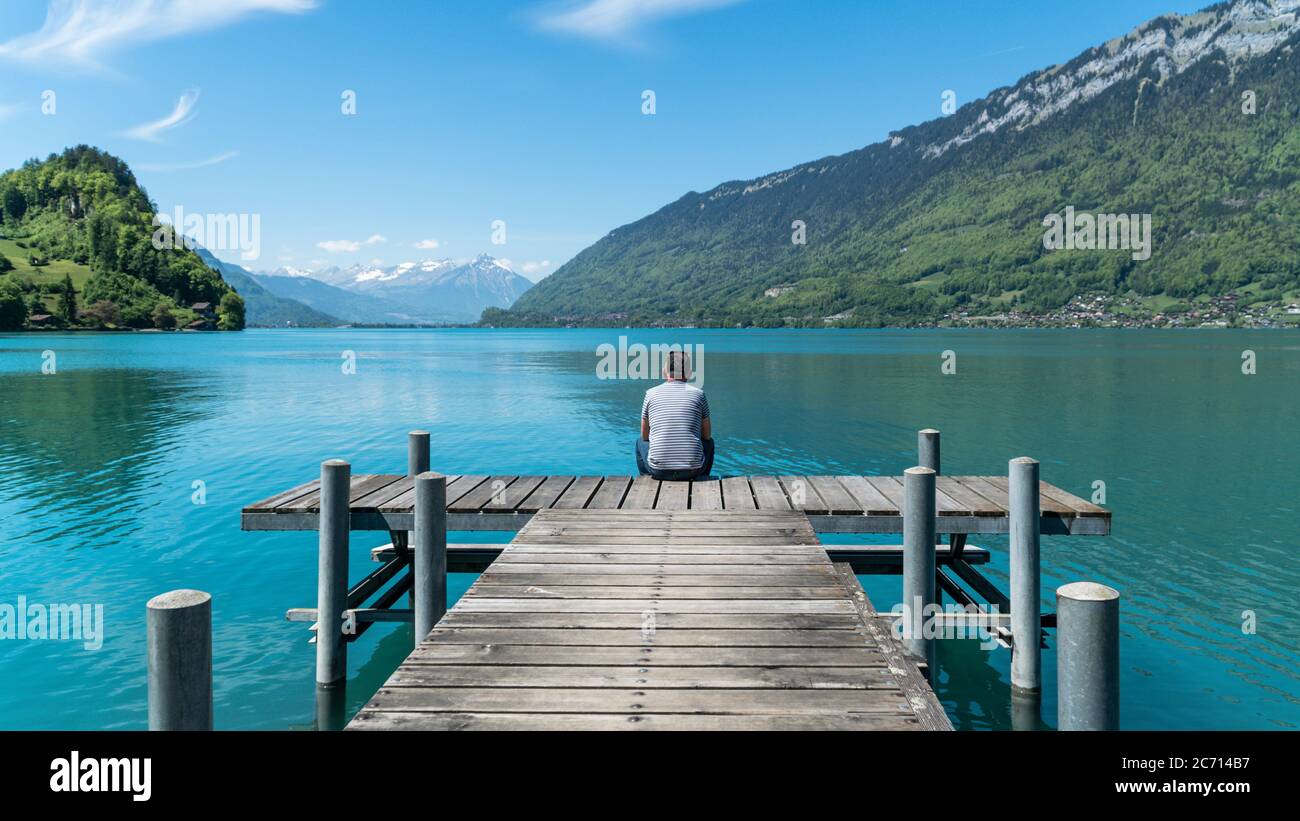 Iseltwald, Switzerland, May 2017: The Pier into the lake Brienzersee in ...