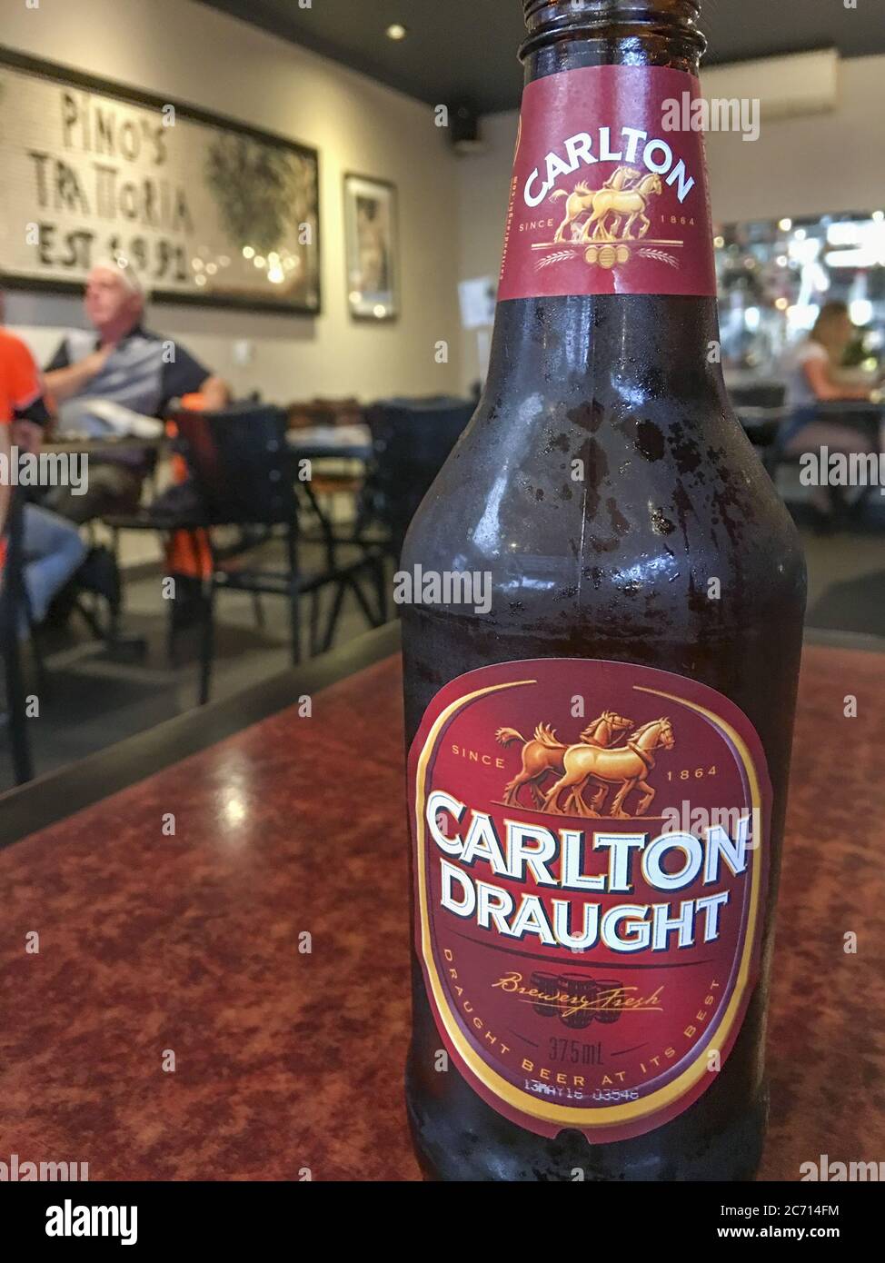 PHILLIP ISLAND, AUSTRALIA - NOVEMBER 2015: Carlton Draught beer bottle ...
