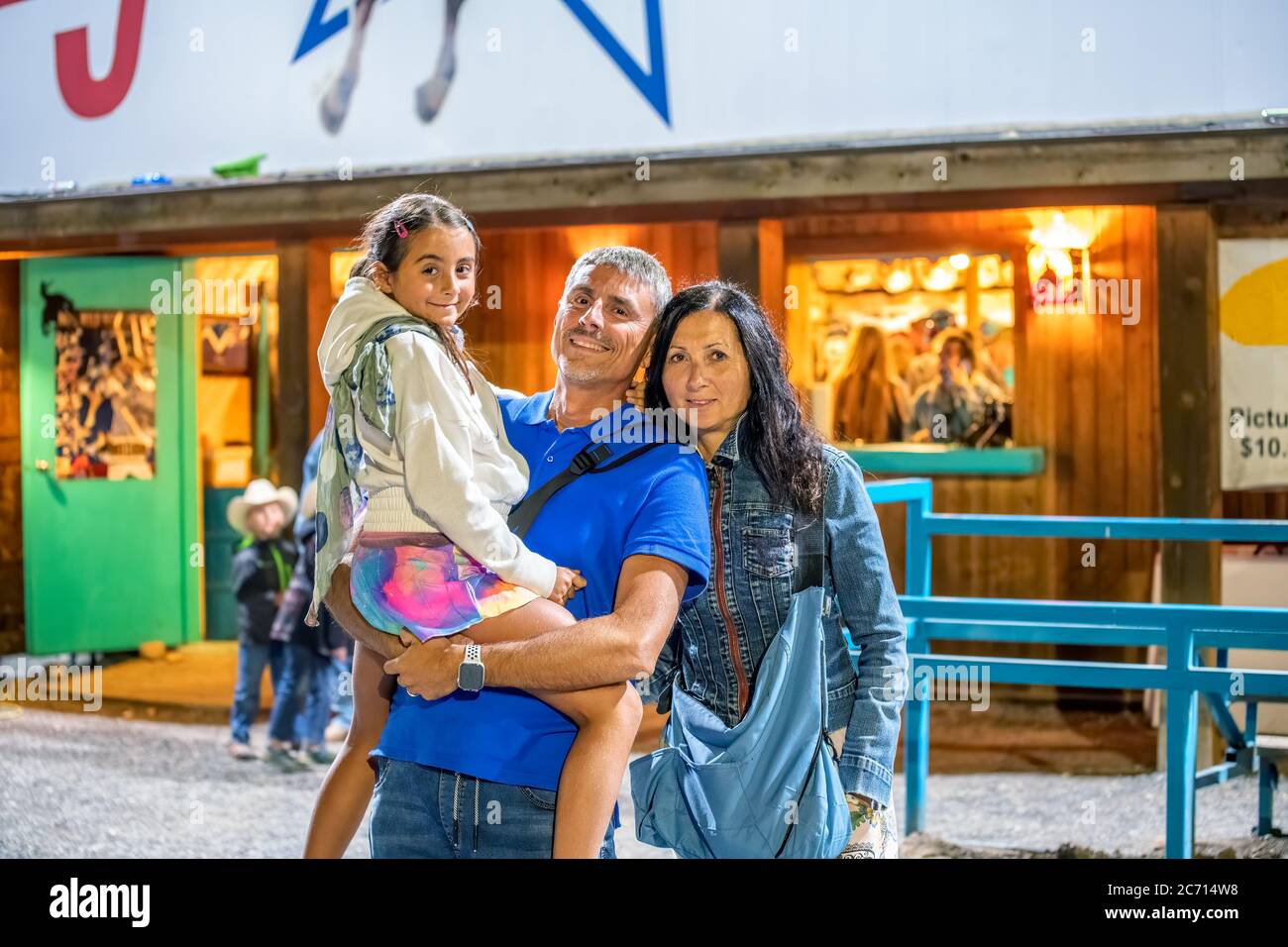 Happy family visiting rodeo show in Wyoming. Tourism concept Stock ...