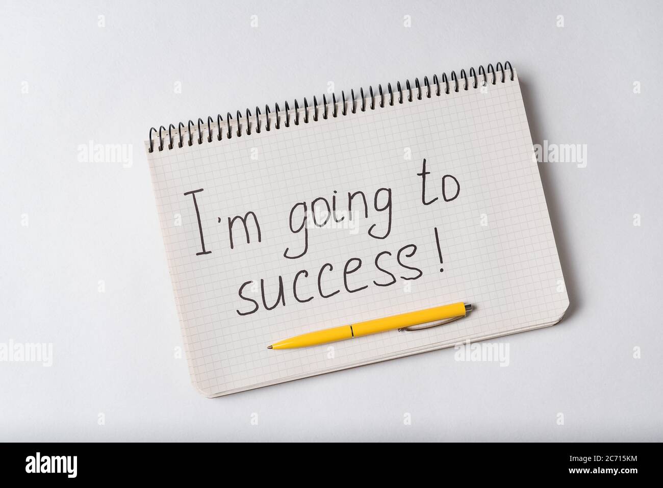 Notepad with the words Im going to success on white background ...