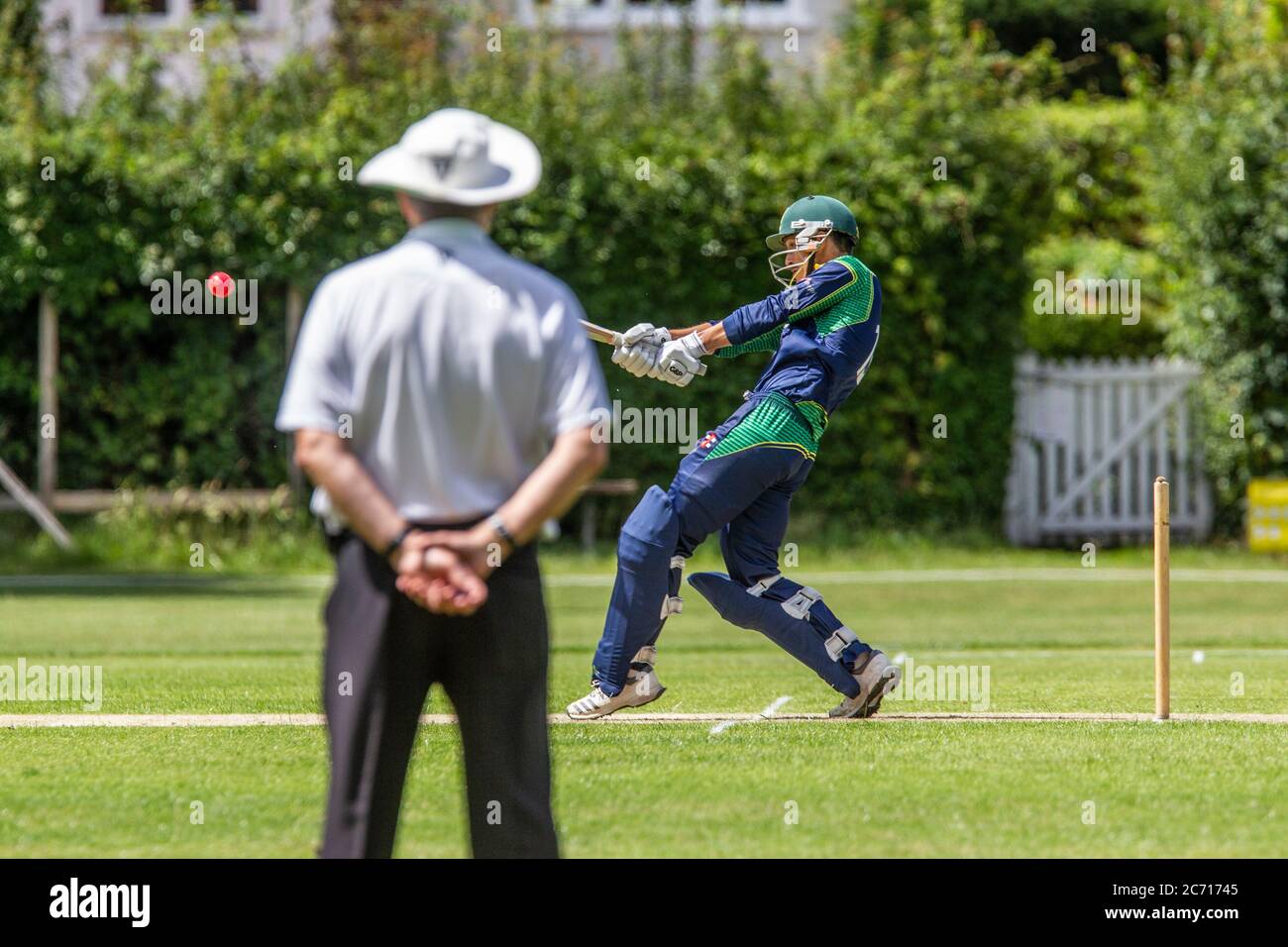 Cricket spectators watch village cricket hi-res stock photography and ...