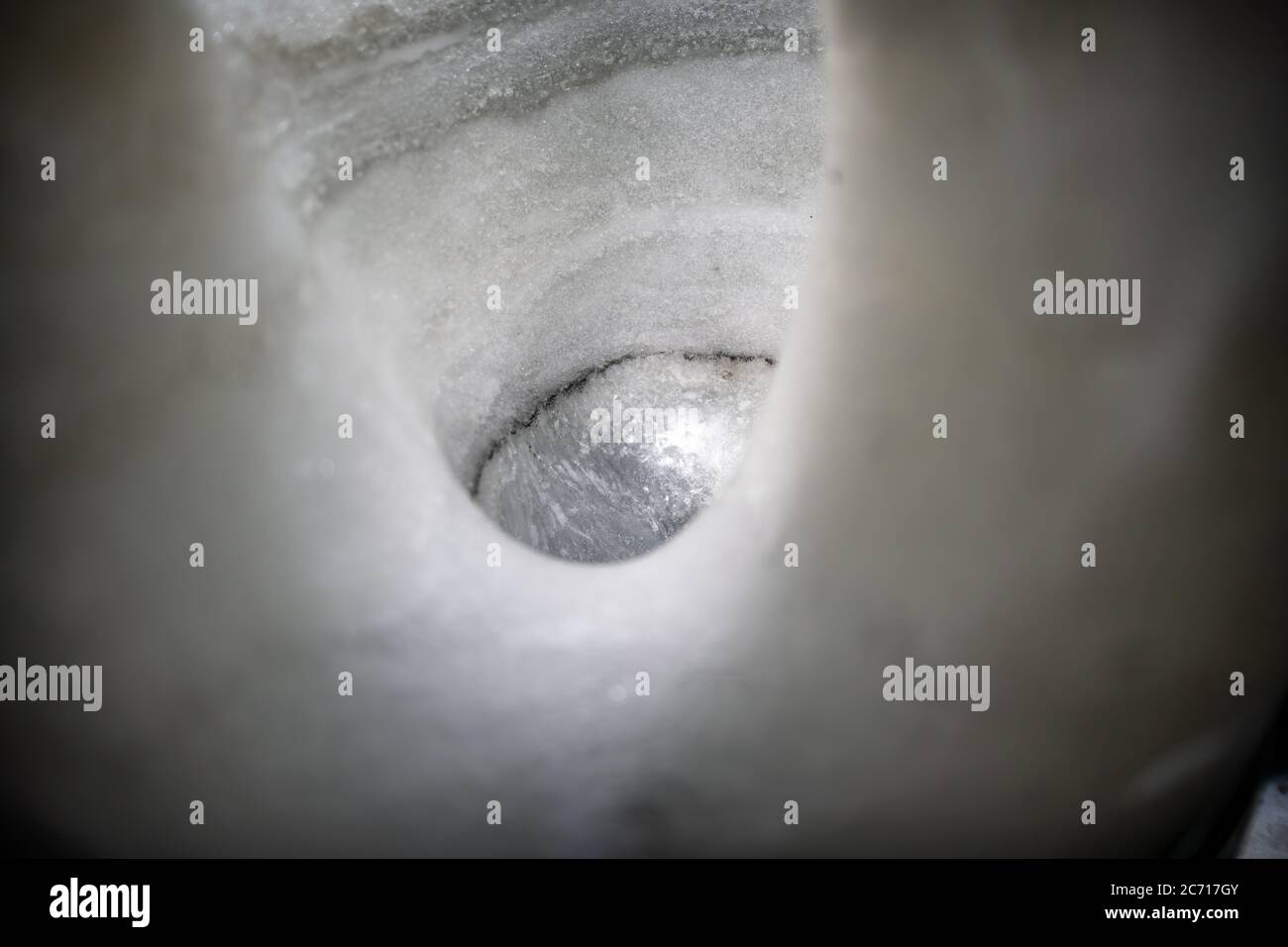 Ice wall with hole, ice cave in Iceland Stock Photo - Alamy