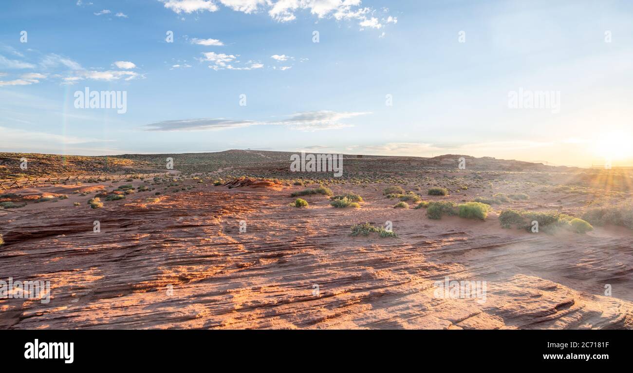 Desert with rocks and blue sky at sunset Stock Photo - Alamy