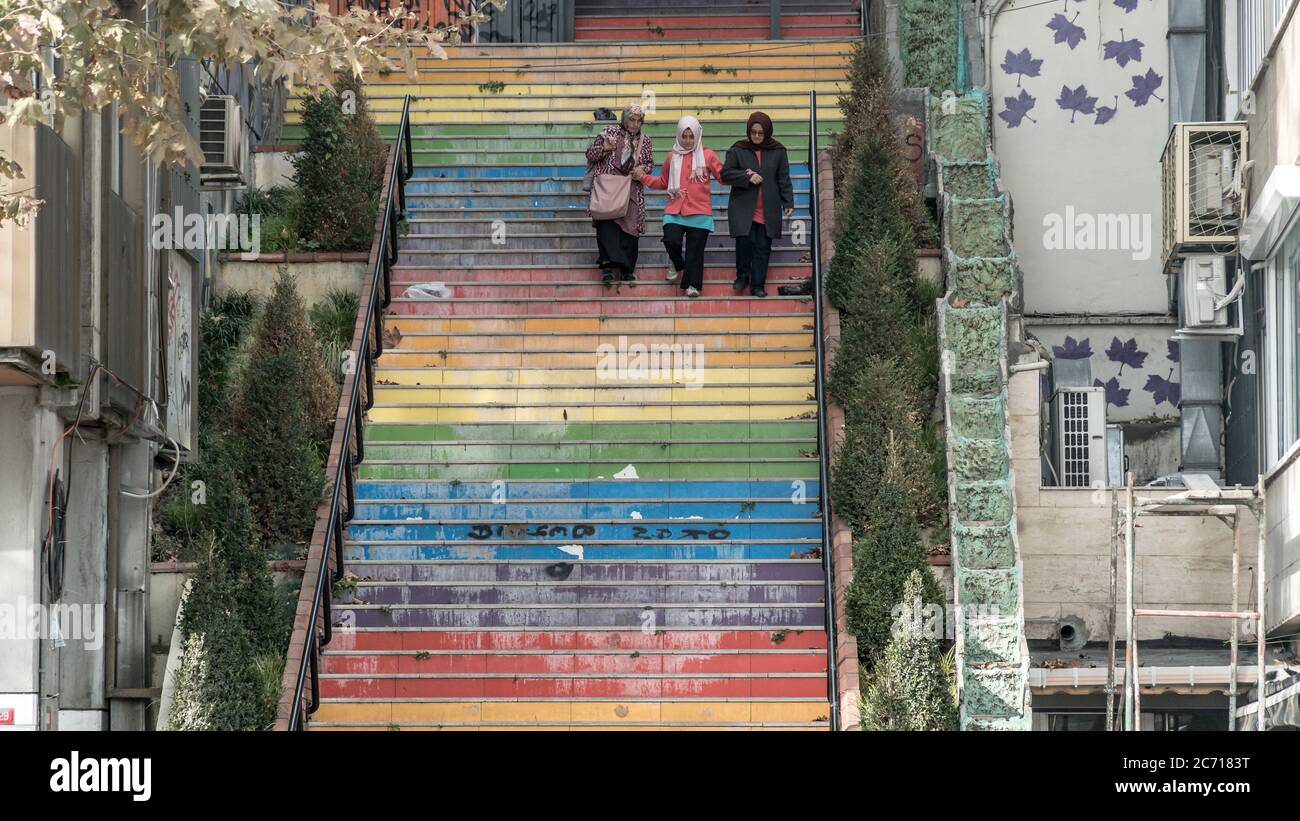 Istanbul, Turkey - December 2017: 3 women walking down the stairs ...