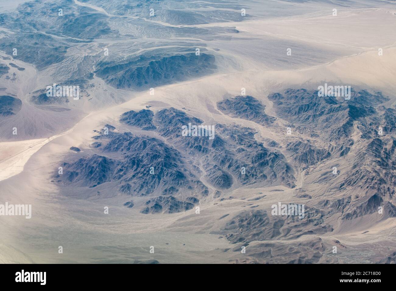 Nevada desert as seen from flying airplane window Stock Photo - Alamy
