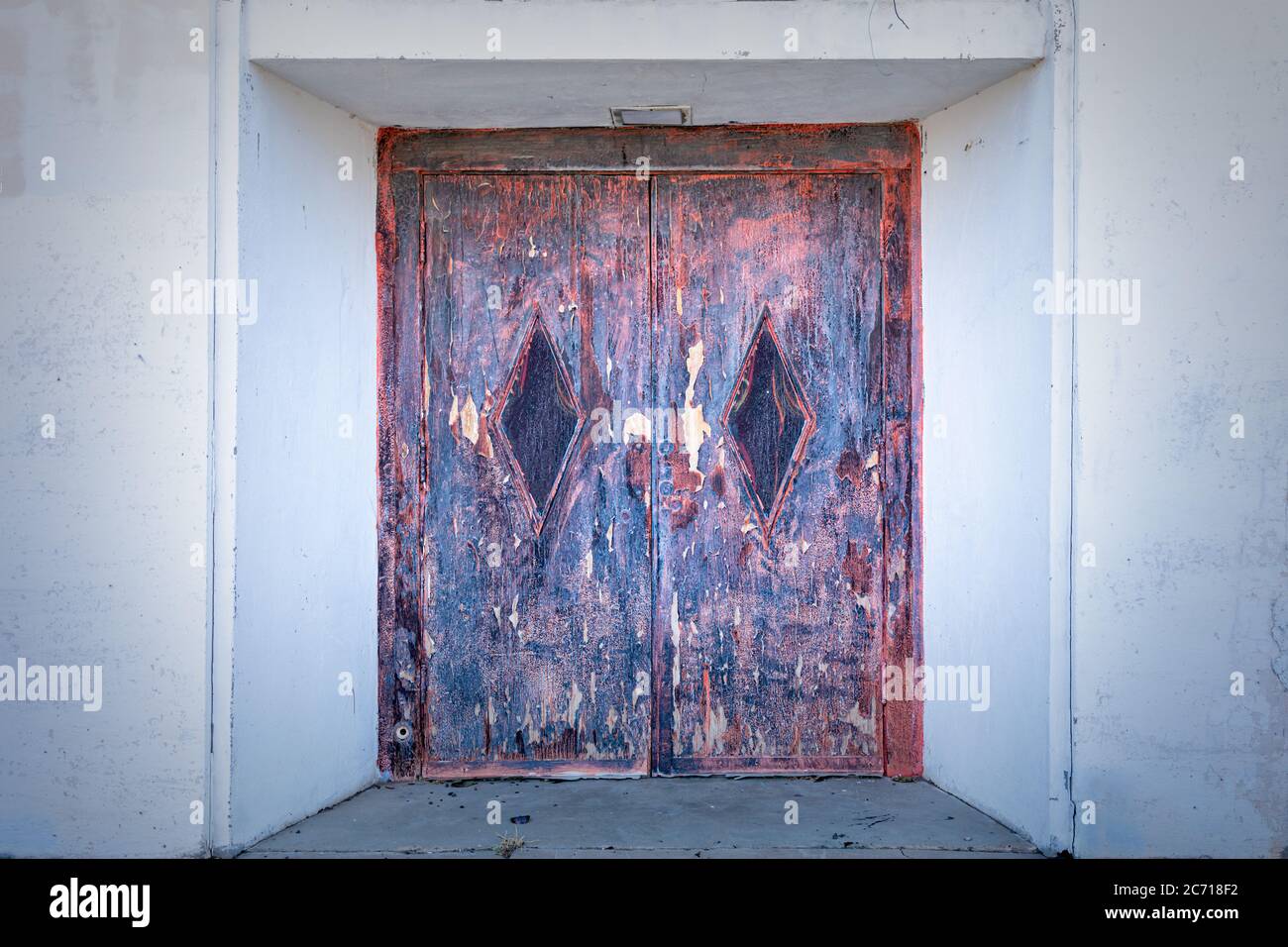 Old and rusty door, entrance to an old abandoned building Stock Photo ...
