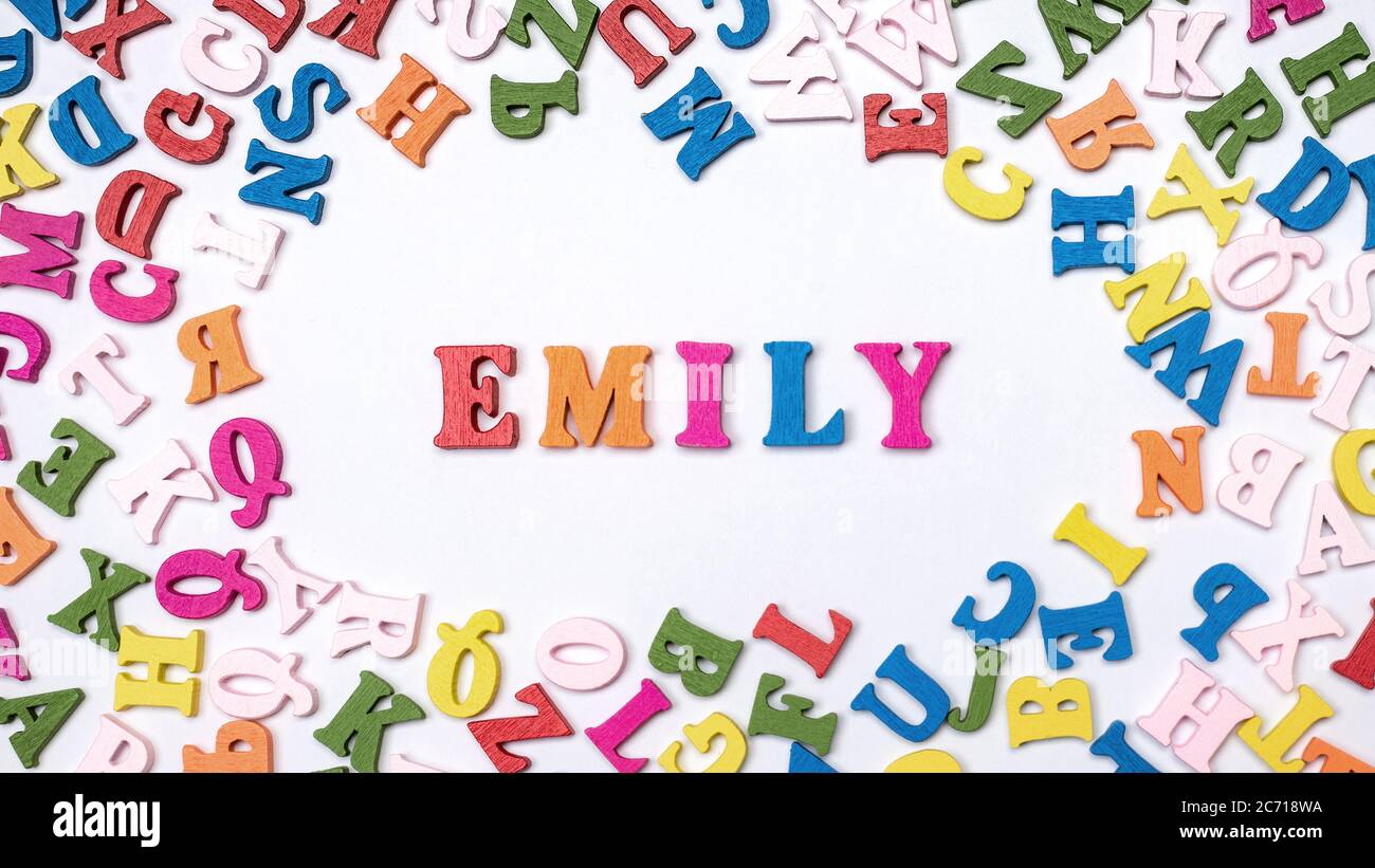 Baby name EMILY composed of wooden letters on floor Stock Photo - Alamy