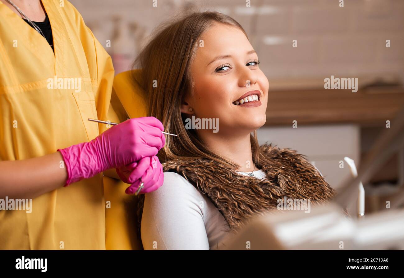 Beautiful young blonde women at dentist, dental care Stock Photo - Alamy