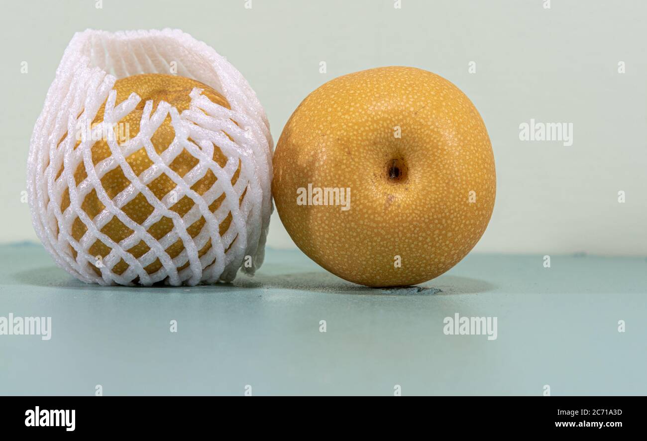 Fresh fruit of pear-nashi, nashi or náxi. Pear of the Asian variety ...